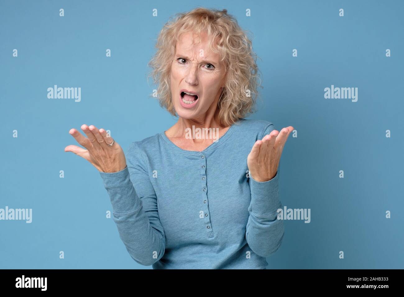 Woman crazy studio shot hi-res stock photography and images - Alamy