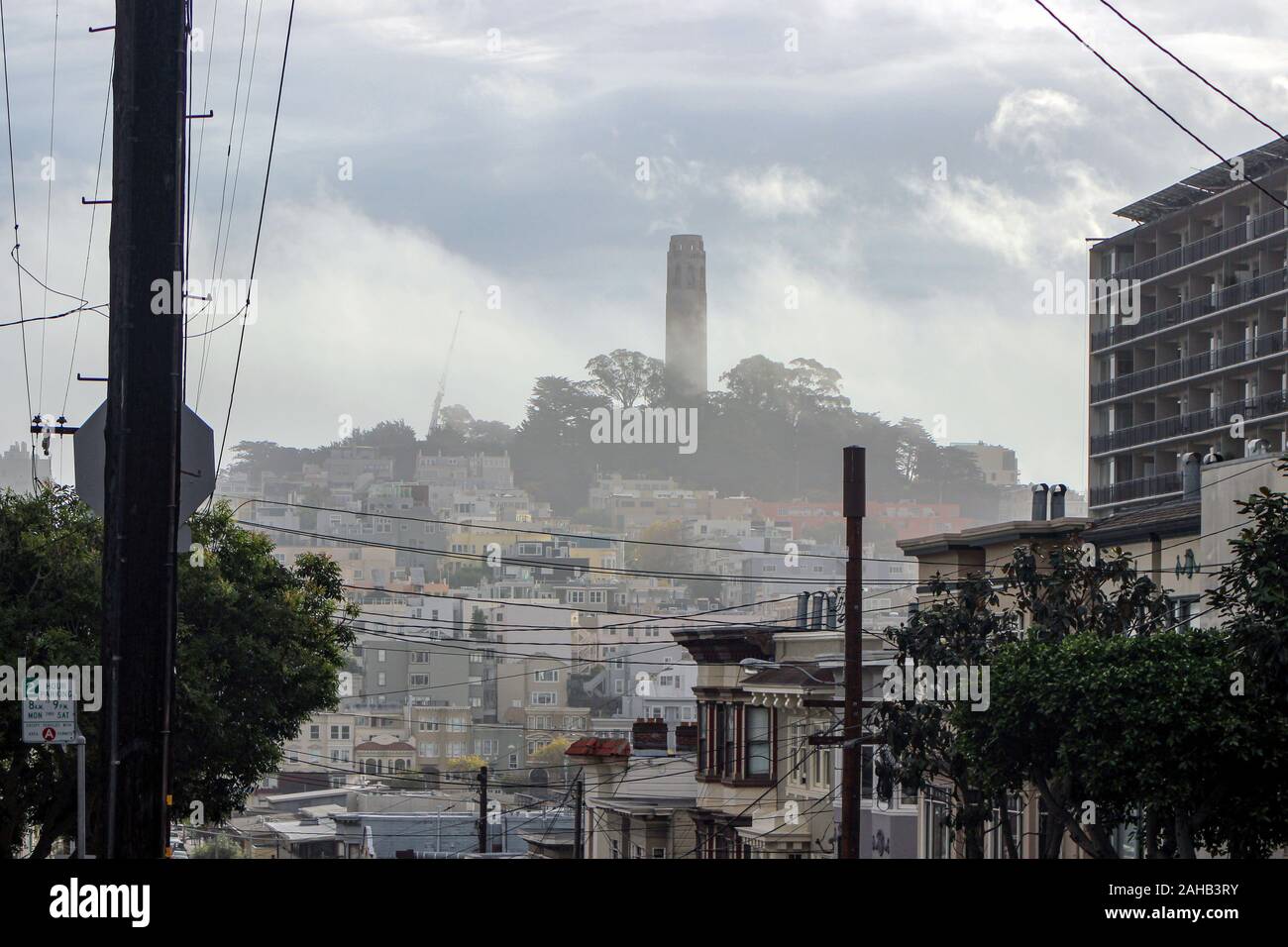 Iconic Landmark Coit Tower On Misty Telegraph Hill Viewed From Russian