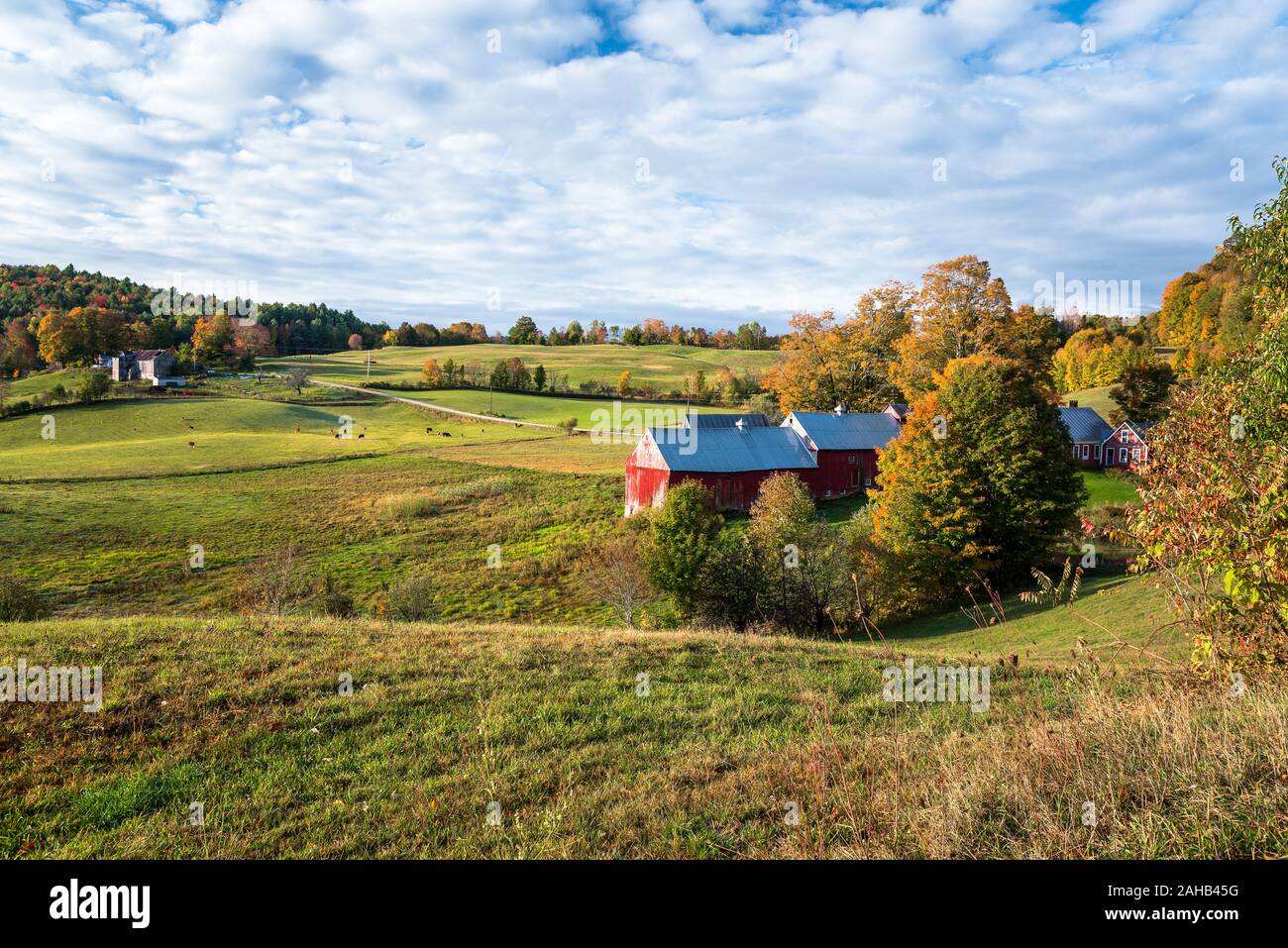 Farm with a red barn in a autumnal rural landscape at sunrise Stock ...