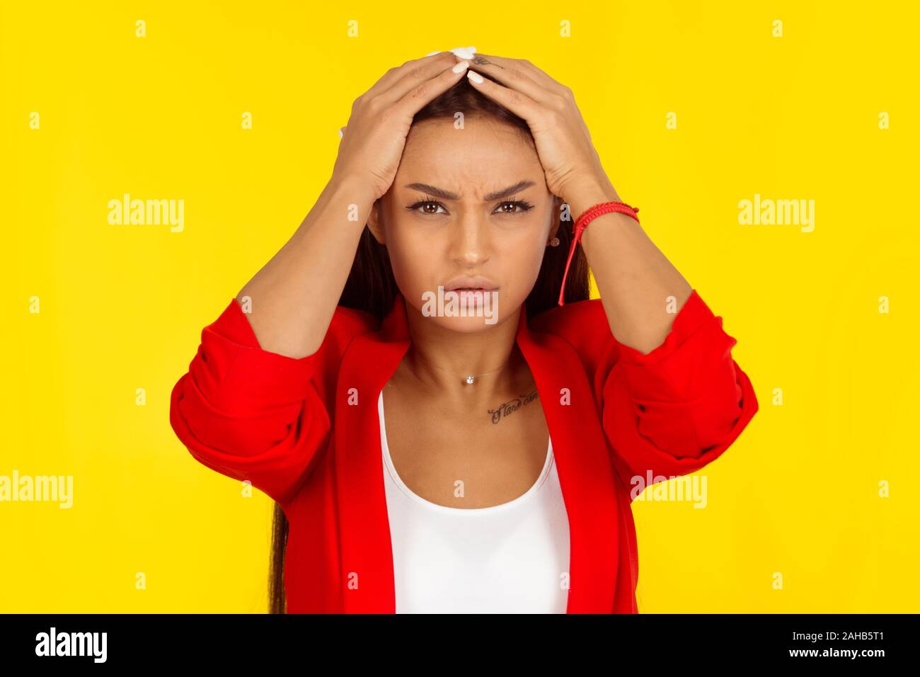 Portrait stressed out young woman with worried face expression hands on ...