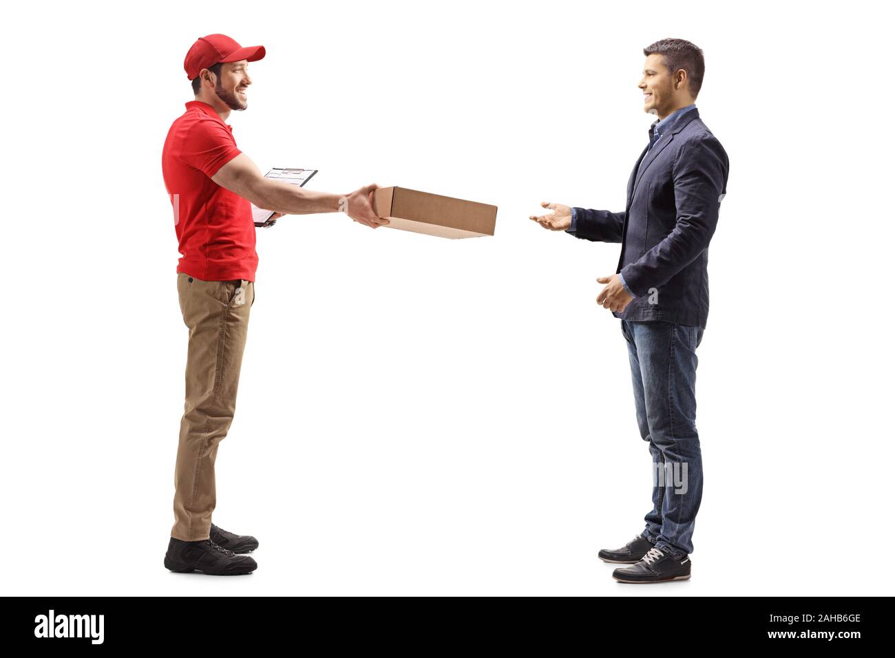 Full length portrait of a postman delivering a package to a young man ...