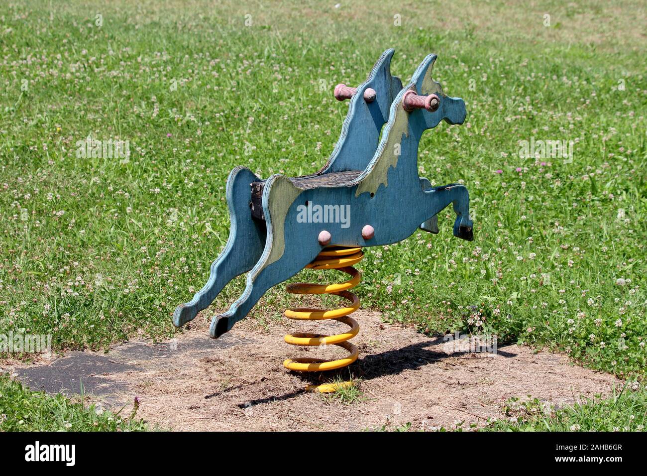 Double retro vintage old dilapidated public playground equipment in ...