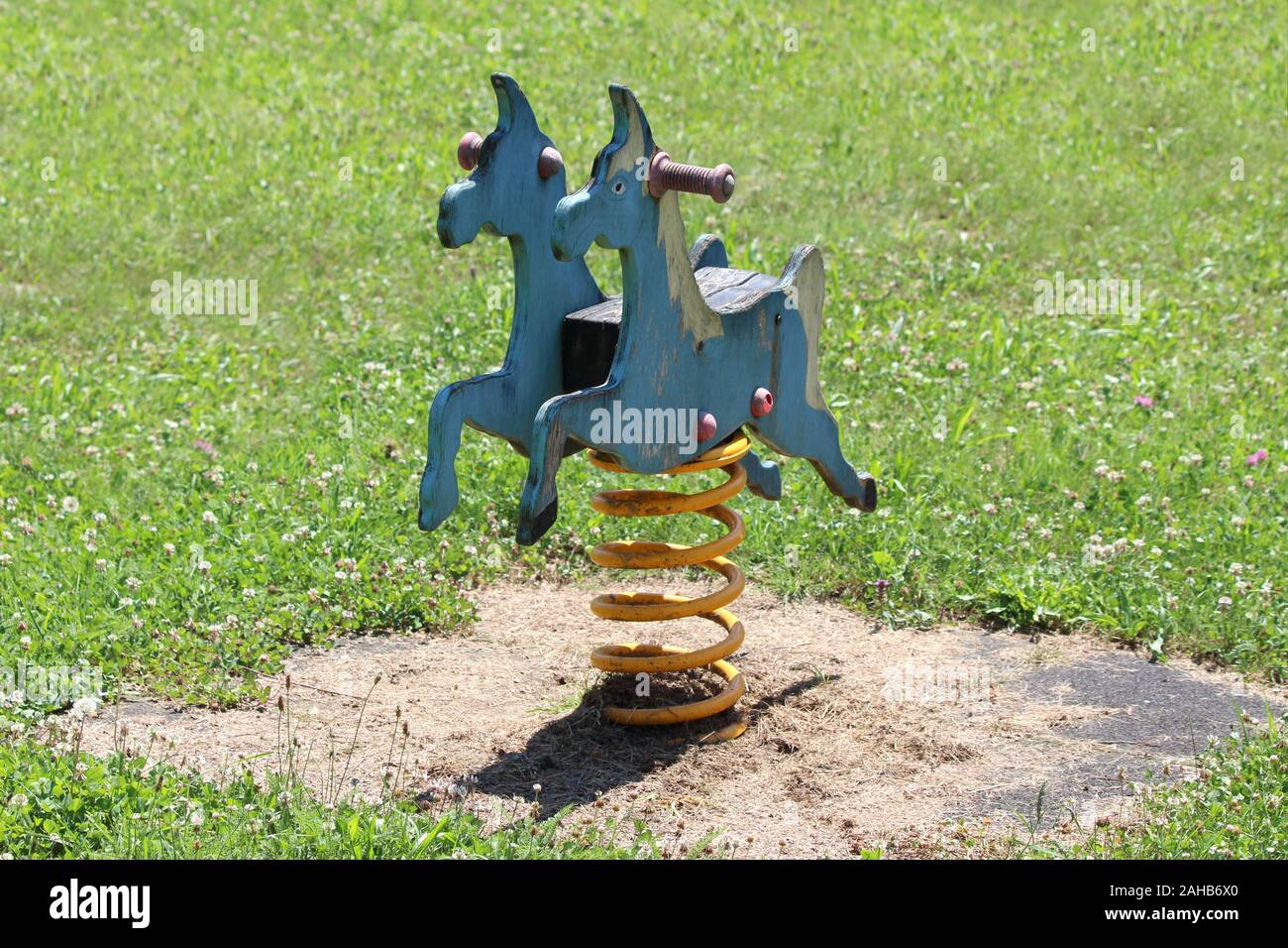 Front view of double retro vintage old dilapidated public playground ...