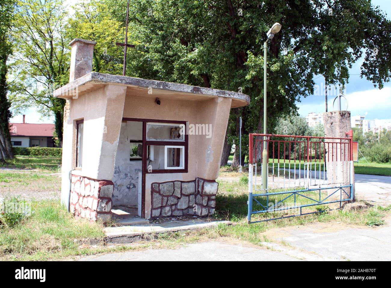 Guard house with broken doors and windows at abandoned military complex ...