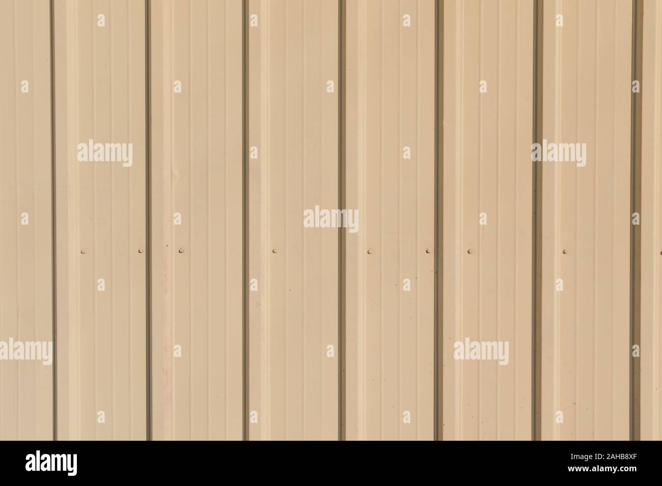 Cream metal industrial siding wall background texture Stock Photo - Alamy
