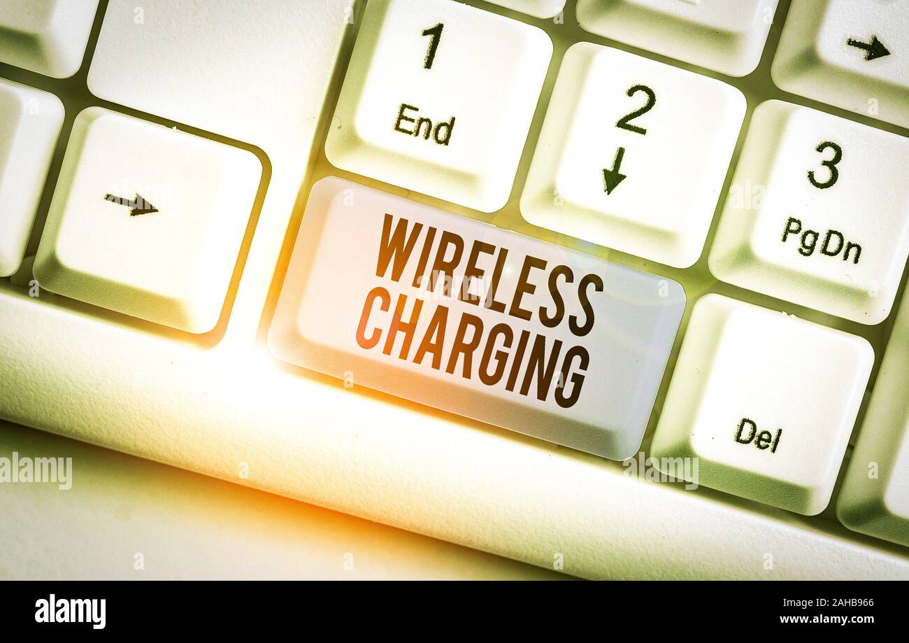 Writing note showing Wireless Charging. Business concept for methods of ...