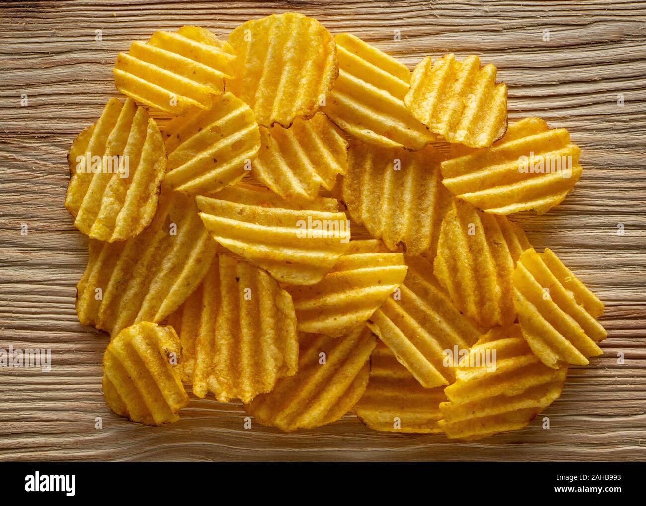 Texture fried golden brown potato chips, close-up Stock Photo - Alamy
