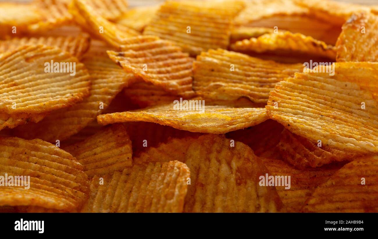 Texture fried golden brown potato chips, close-up Stock Photo - Alamy