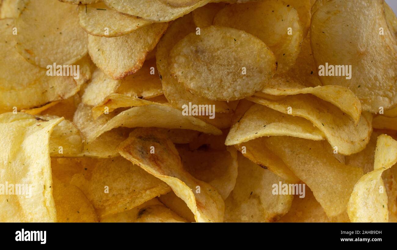 Texture fried golden brown potato chips, close-up Stock Photo - Alamy