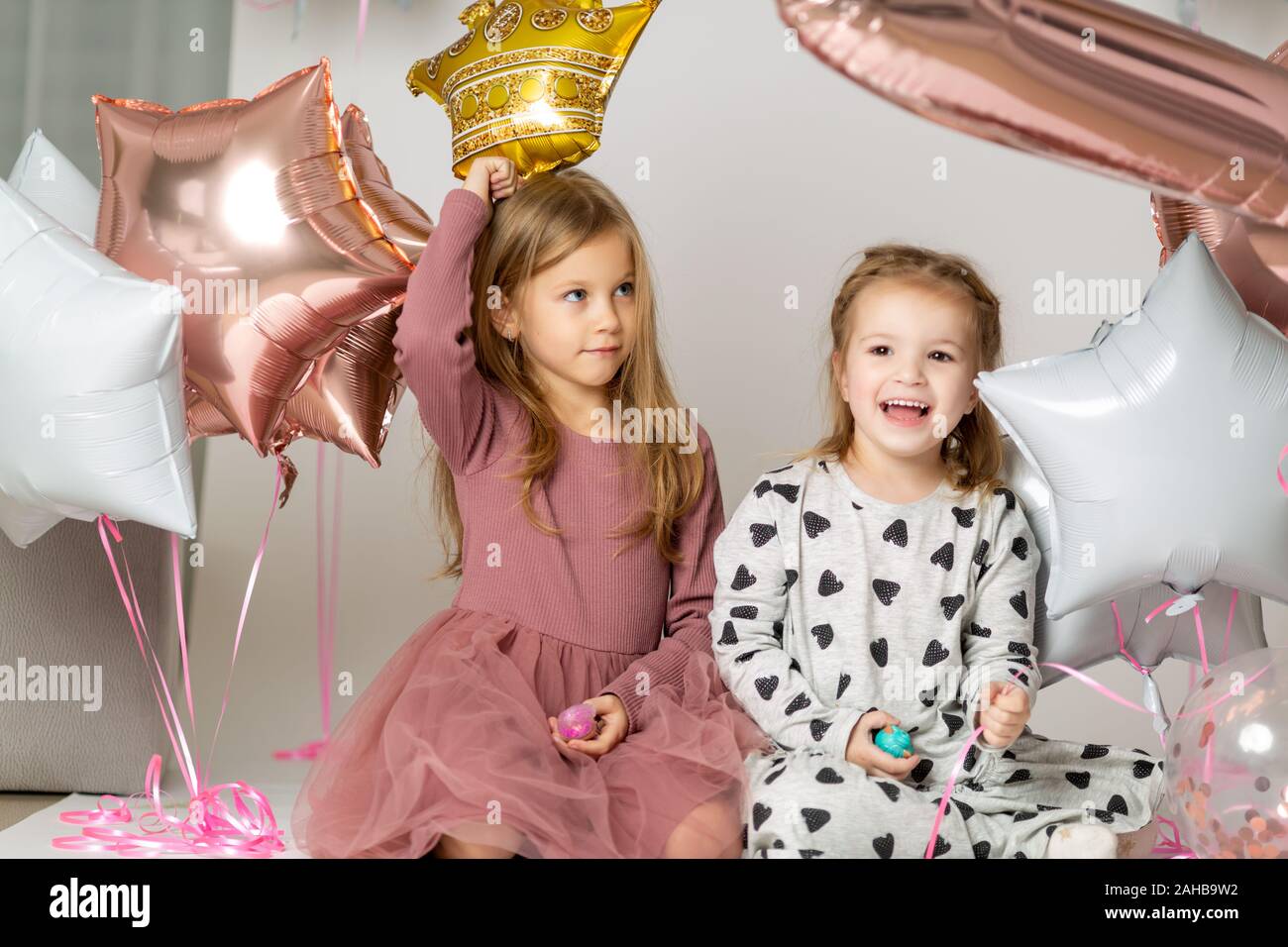Close up portrait of Two sisters, 7 Years Old Blonde Toddler Girl and 3 ...