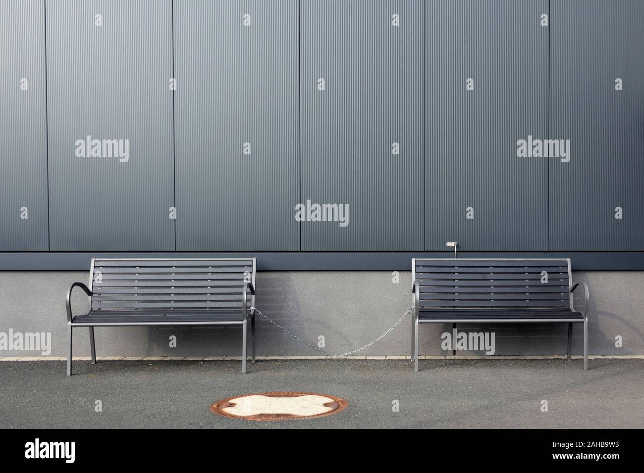 Modern outdoor relaxation area with bench outside Stock Photo - Alamy