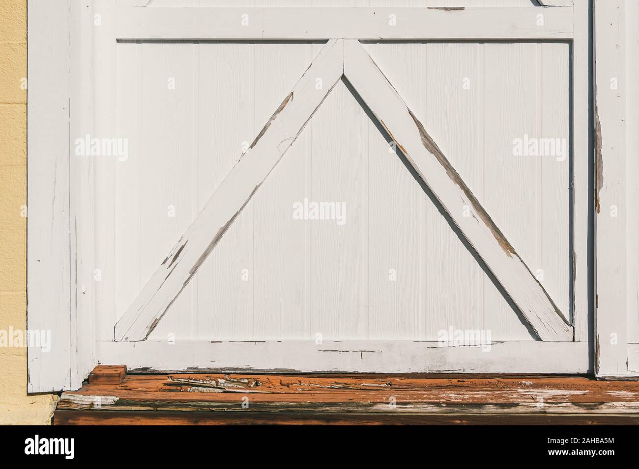 Distressed white barn style door background texture Stock Photo - Alamy