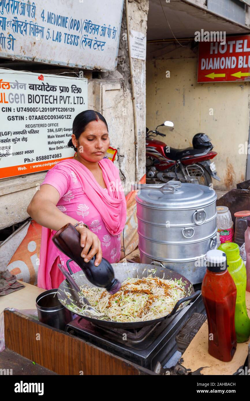 Indian poor woman cooking hi-res stock photography and images - Alamy
