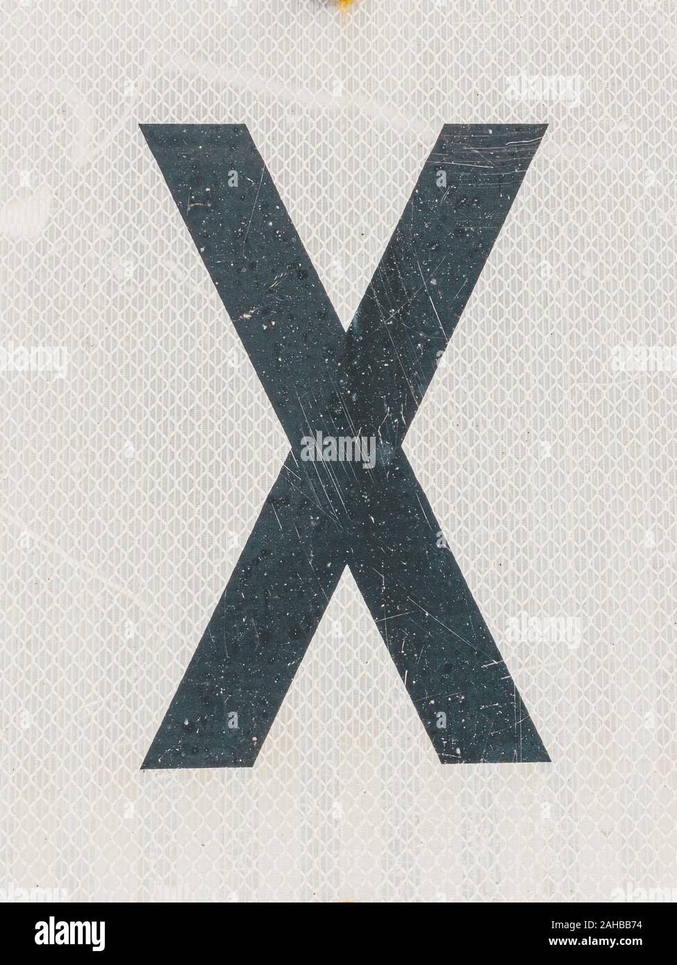Letter X railroad crossing sign background texture Stock Photo - Alamy