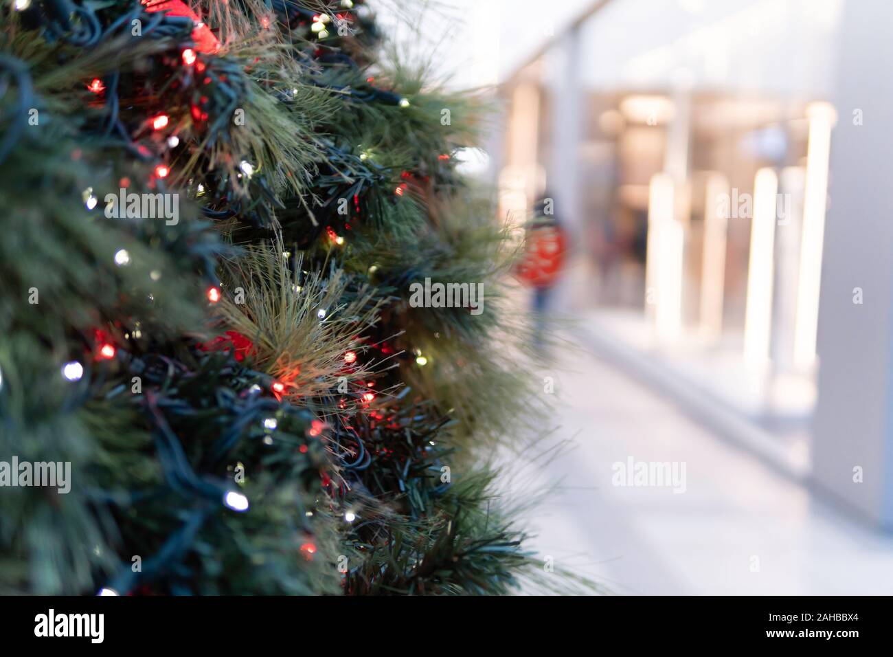 Christmas tree on display in shopping mall during boxing day and year ...