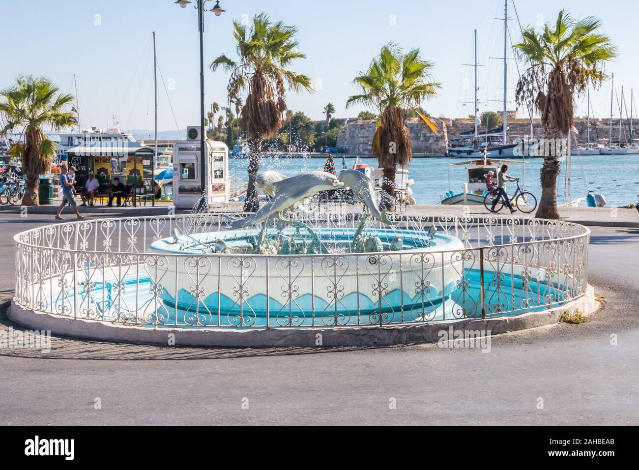 Kos, Greece - September 21st 2019: Dolphin fountain at roundabout by ...