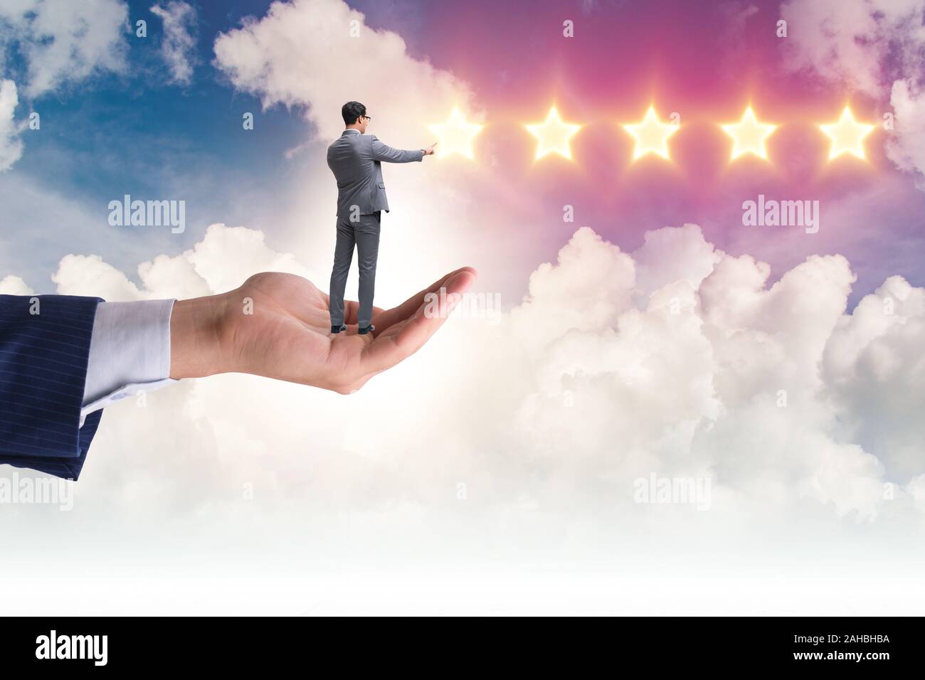 The businessman held on hand reaching out for stars Stock Photo - Alamy
