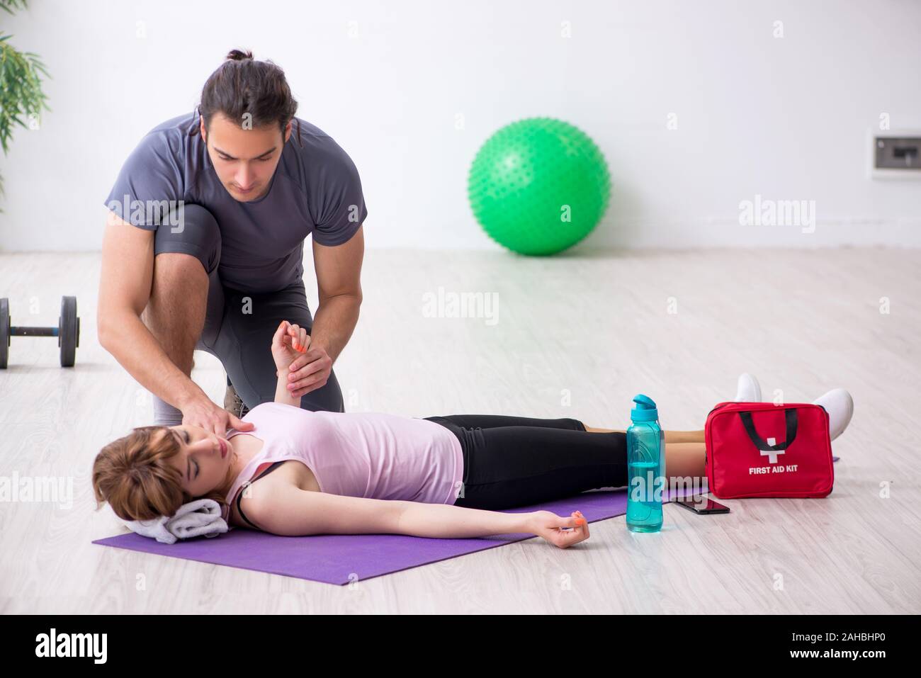 The young woman feeling bad during training in first aid concept Stock ...