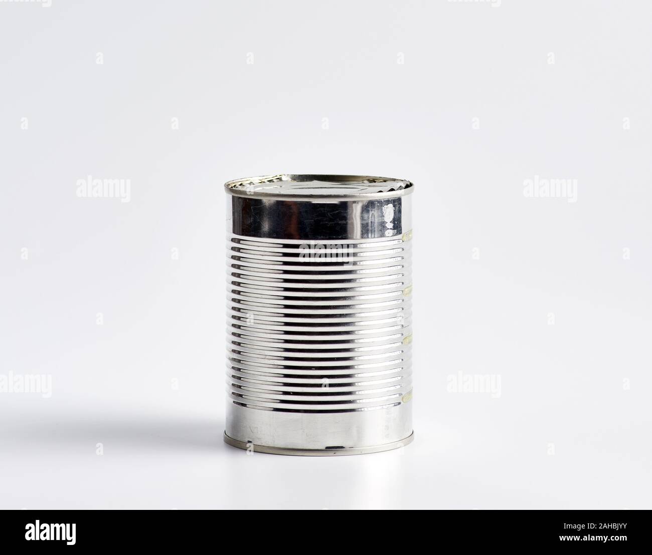 hard iron can for food preservation on a white background Closeup Stock ...