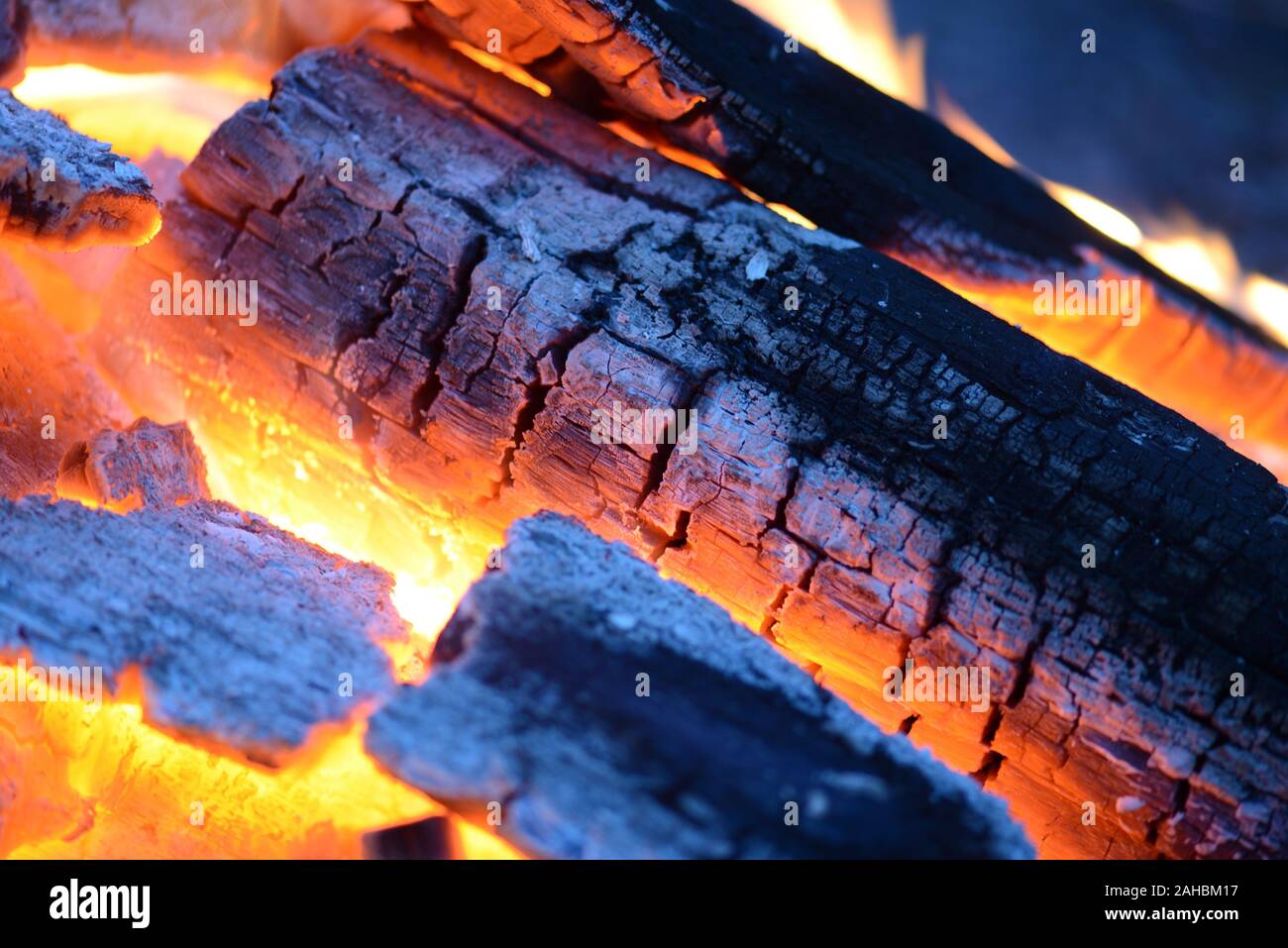 The hot coals of a burning bonfire close-up. Abstract background Stock ...