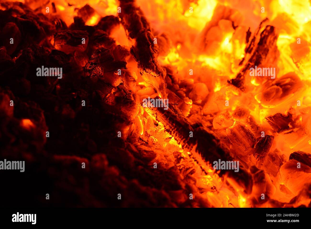 The hot coals of a burning bonfire close-up. Abstract background Stock ...