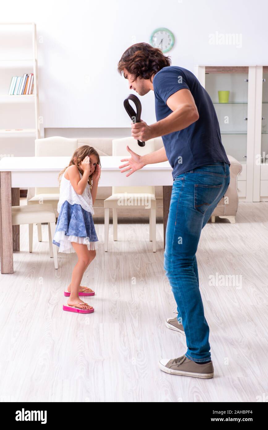 The angry father punishing his daughter Stock Photo - Alamy