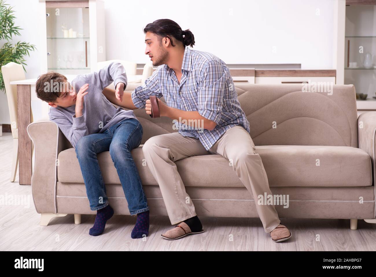 Father Beating Son High Resolution Stock Photography and Images - Alamy
