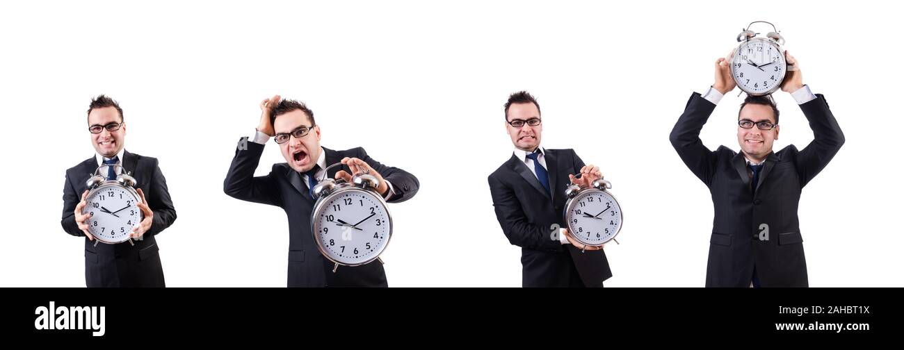 The man with alarm clock isolated on white Stock Photo - Alamy