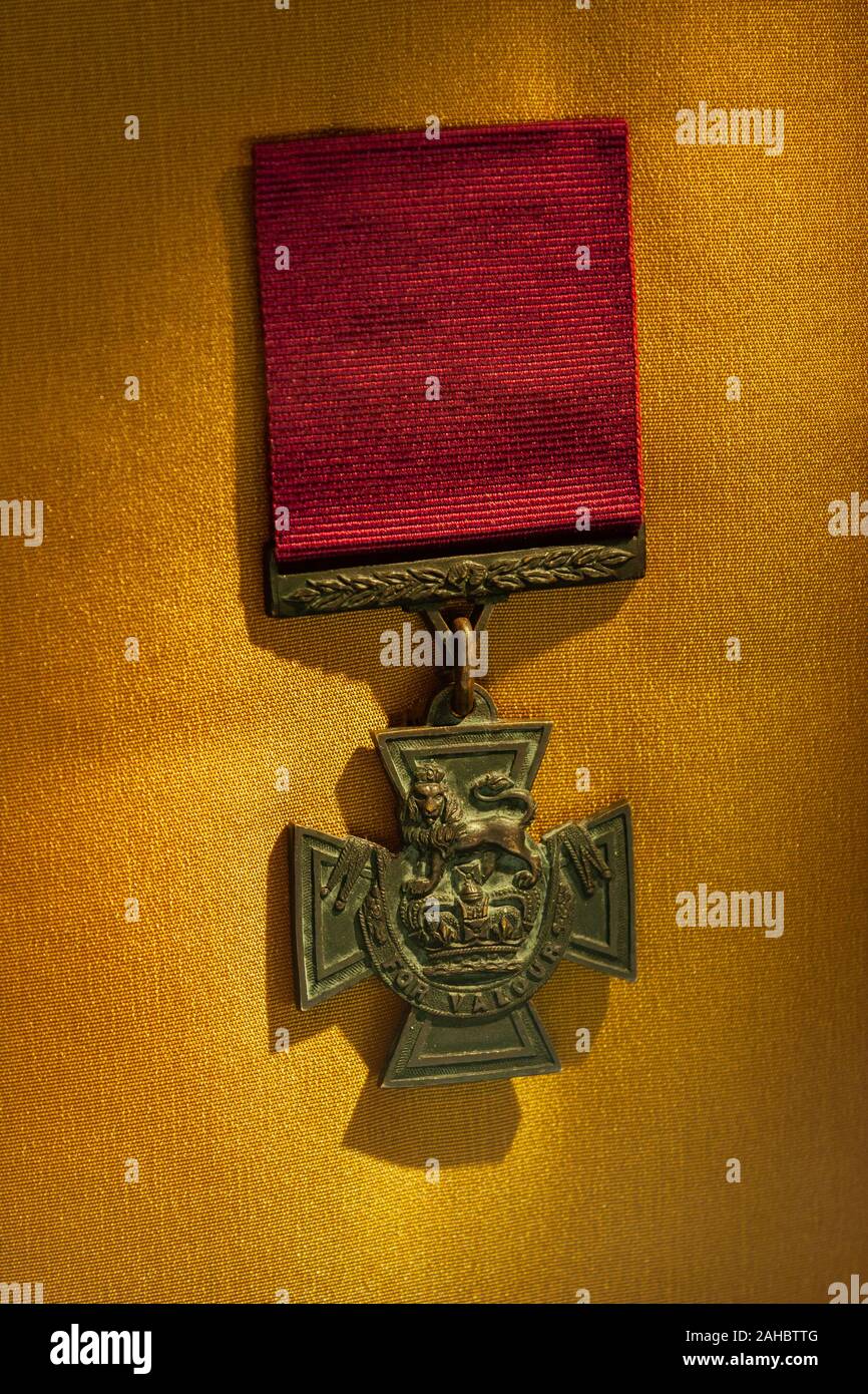 Close up shot of Victoria Cross medal on golden background Stock Photo ...