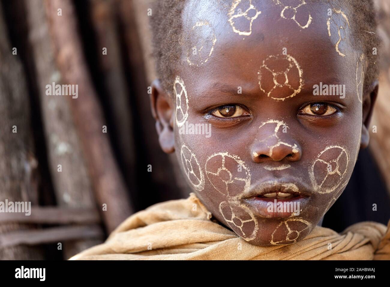 Child from Suri tribe with painted face from West Omo bank in Ethiopia ...