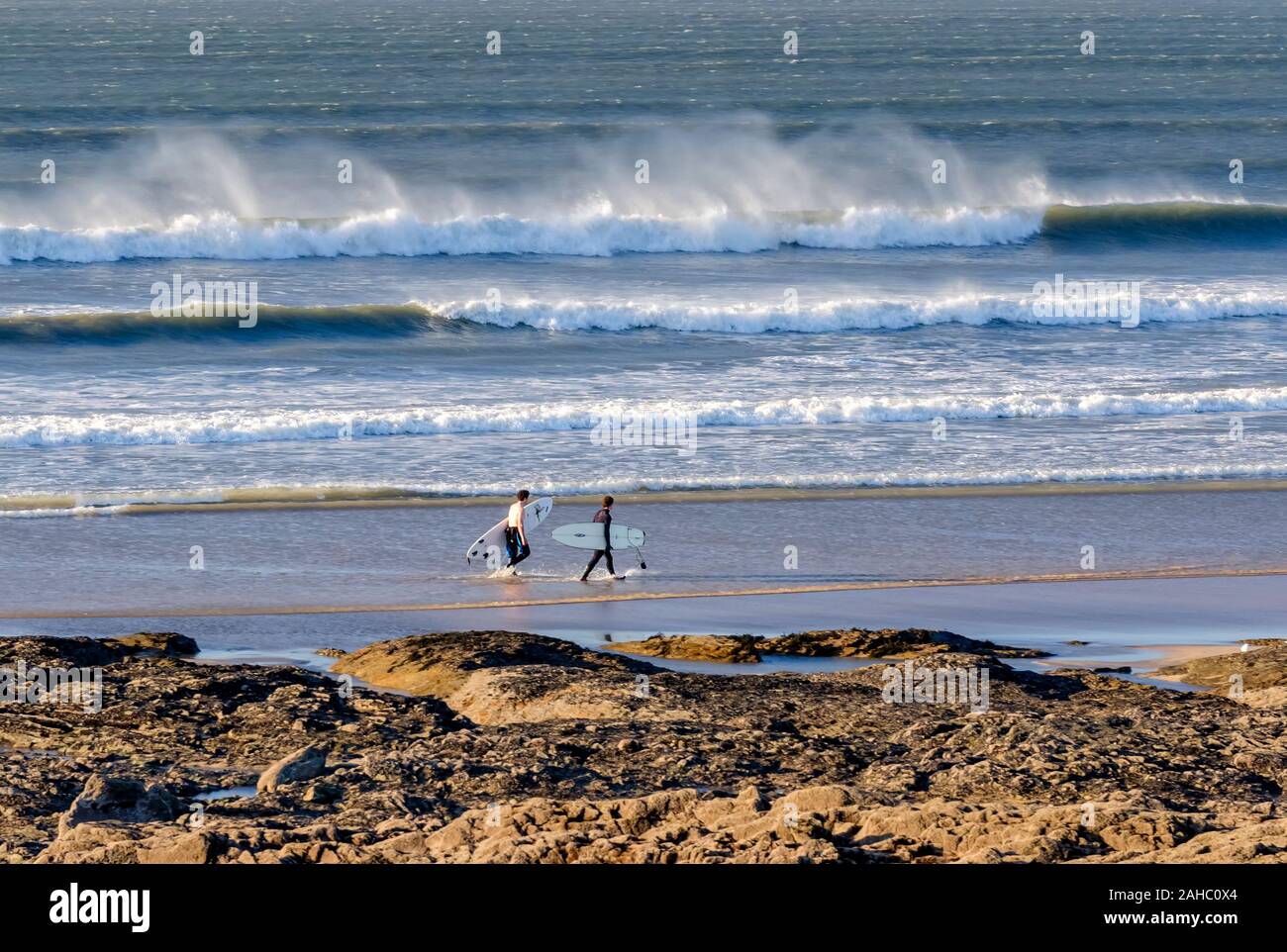 Summer days with blue skies, waves and surfers on Westward Ho! Beach ...