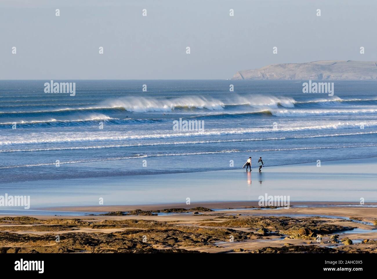 Summer days with blue skies, waves and surfers on Westward Ho! Beach ...