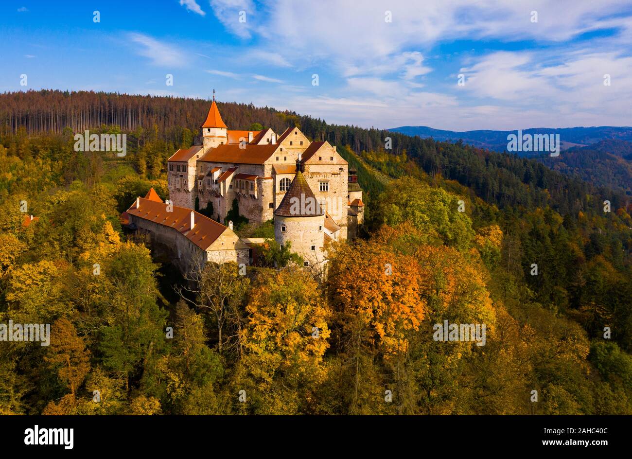Medieval castle of Pernstein on a hill in the forest. South Moravian ...