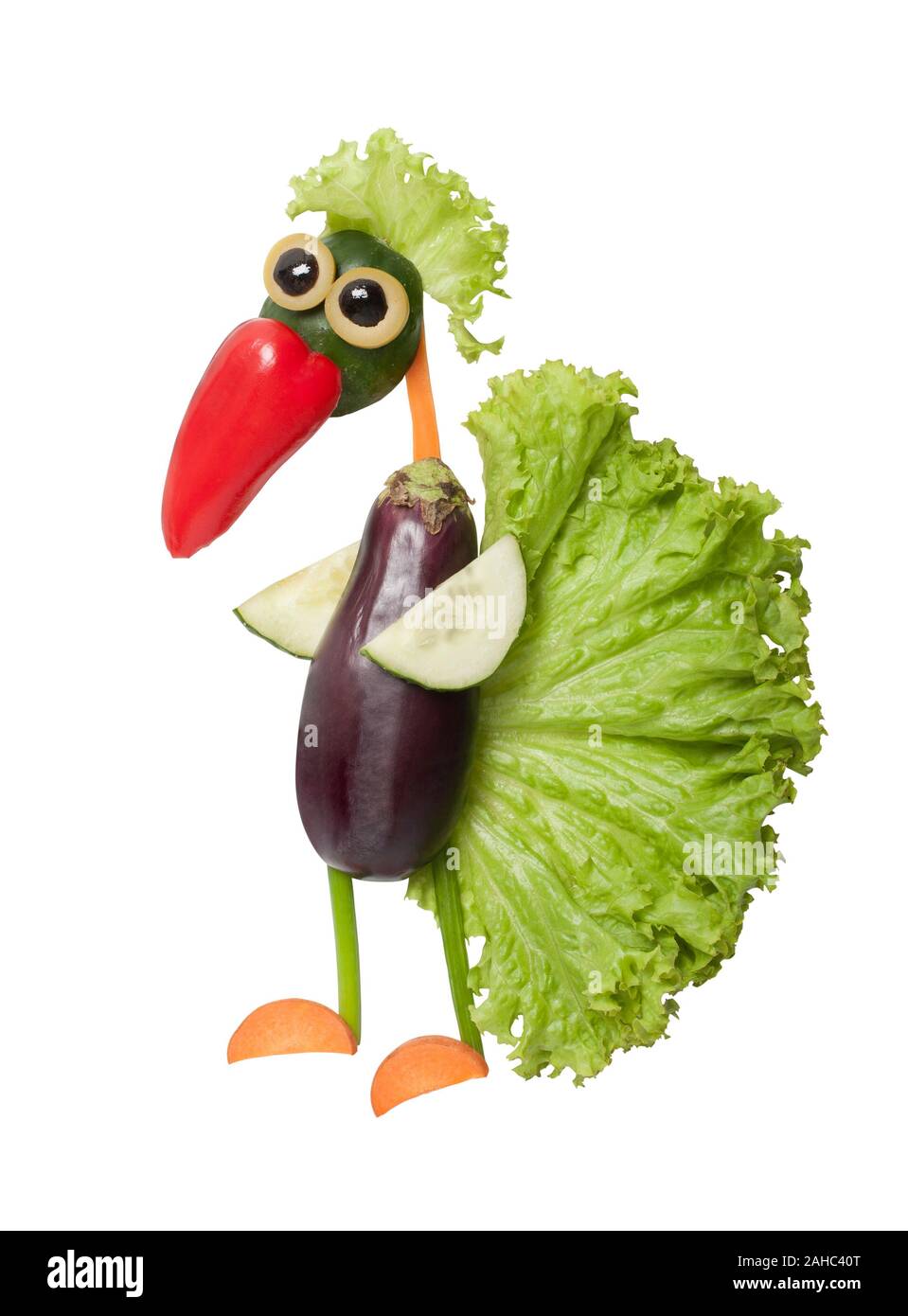 Peacock made with fresh vegetables on white background Stock Photo - Alamy