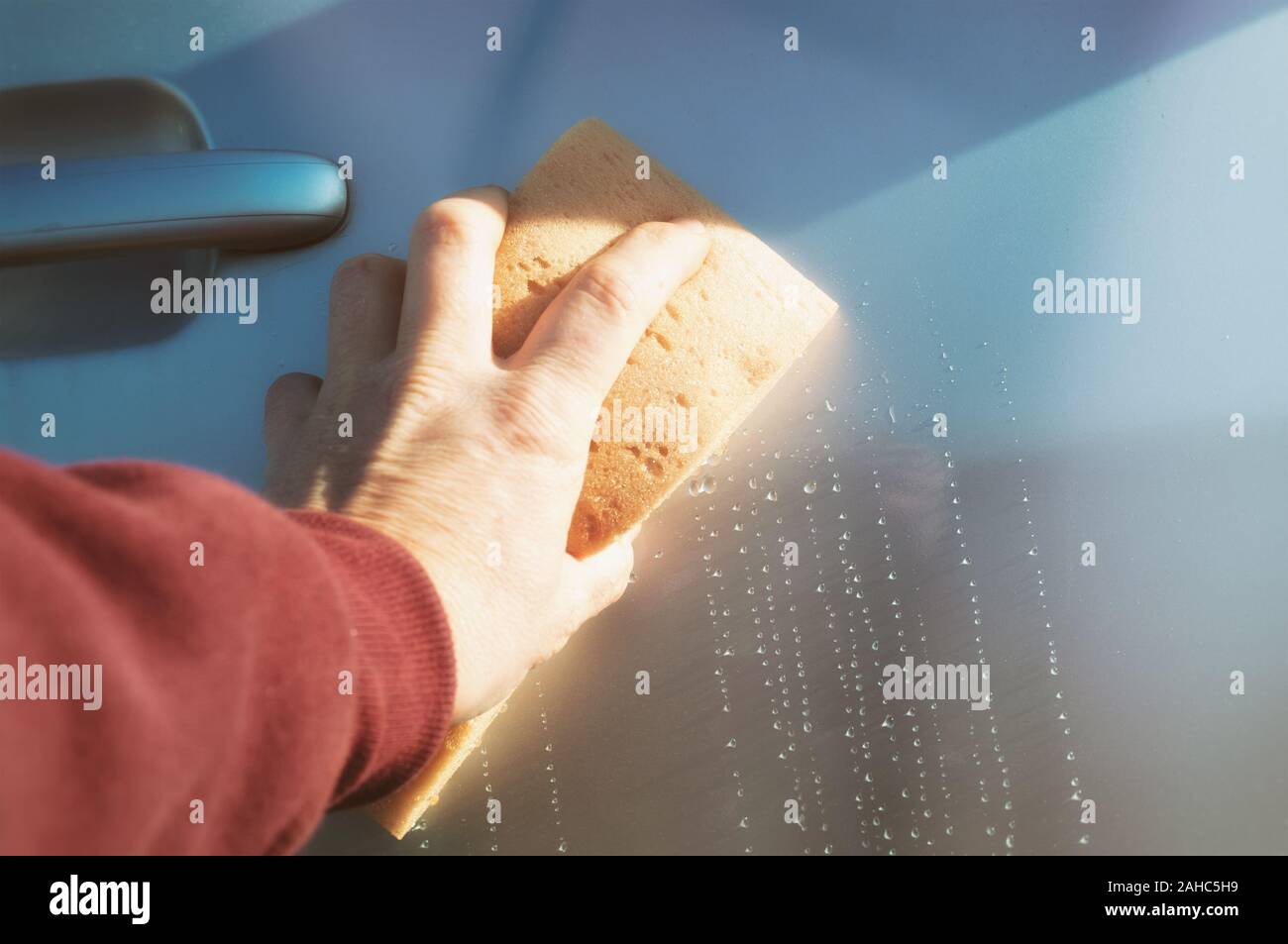 Car wash with sponge Stock Photo - Alamy