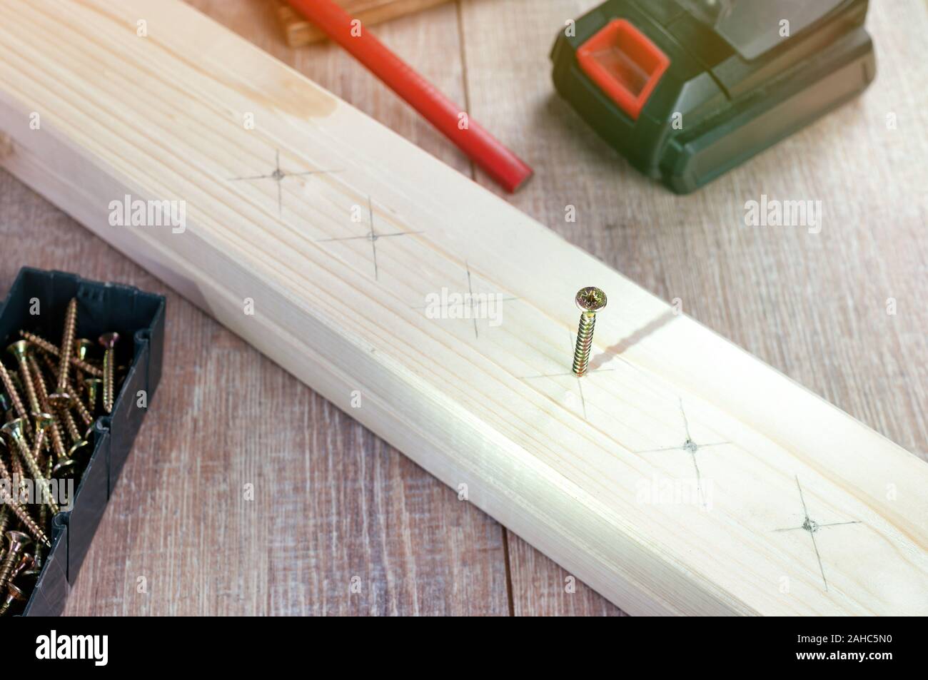 Screw in board hi-res stock photography and images - Alamy