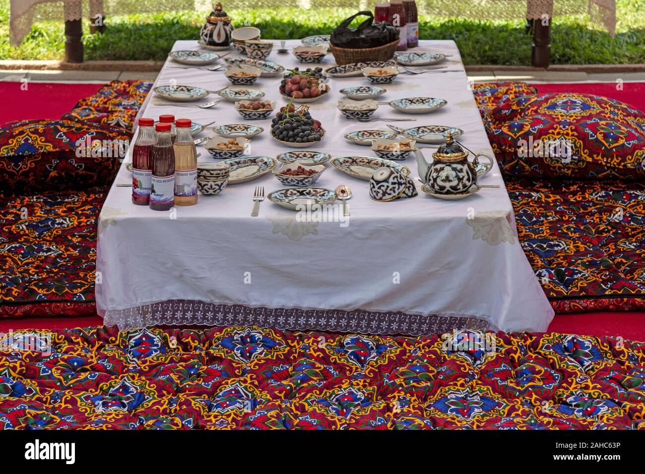 A table set for traditional Uzbek dining at a festival celebrating ...