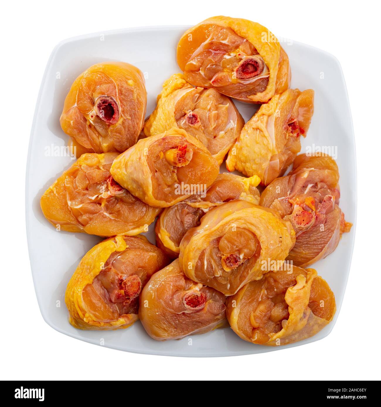 Raw sliced transversely chicken legs. Isolated over white background ...