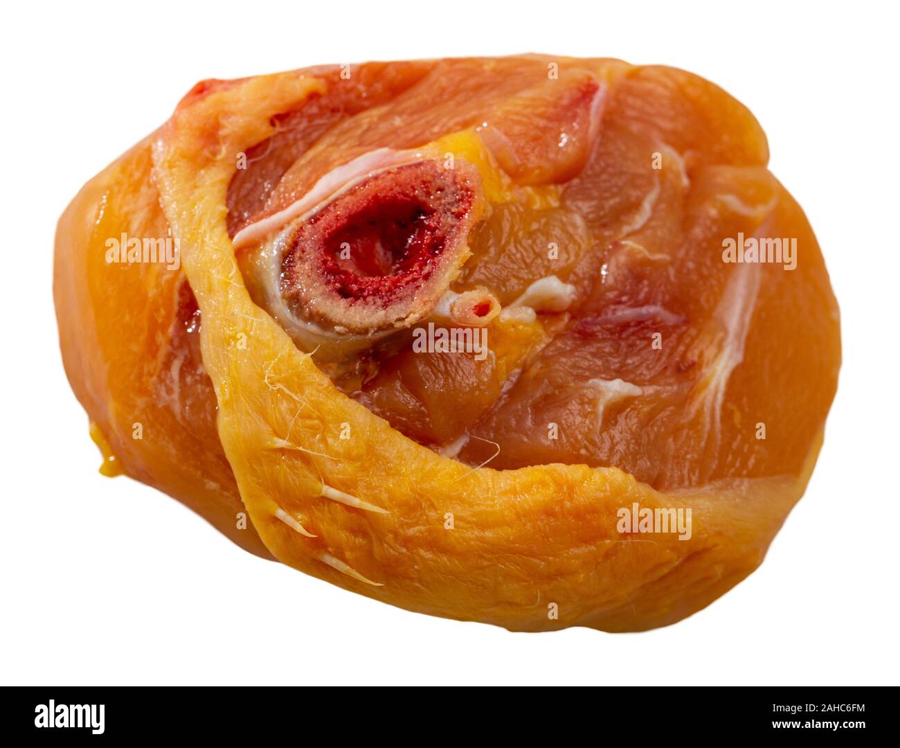 Close up of uncooked sliced transversely chicken leg. Isolated over ...