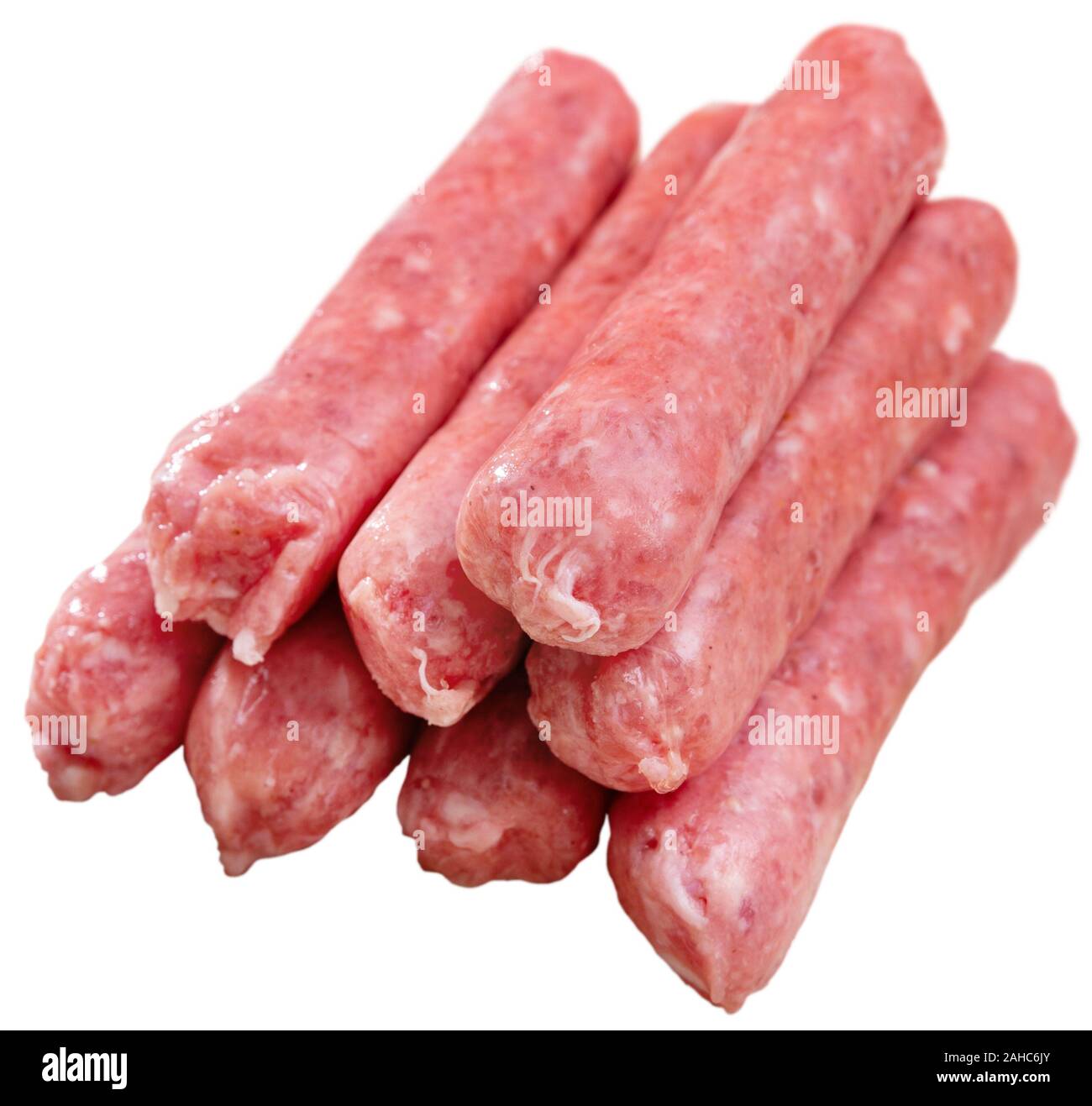 Uncooked sausages. Isolated over white background Stock Photo - Alamy