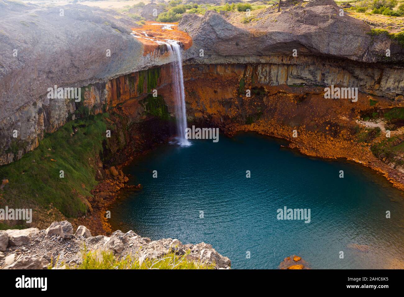 Falling down water flow Salto del Agrio waterfall. Patagonia, Argentina ...