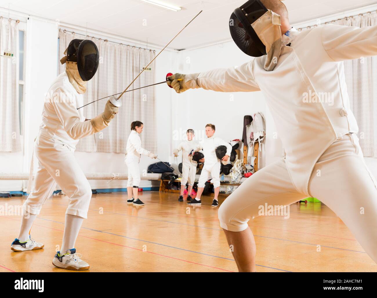 Fencers teenage hi-res stock photography and images - Alamy