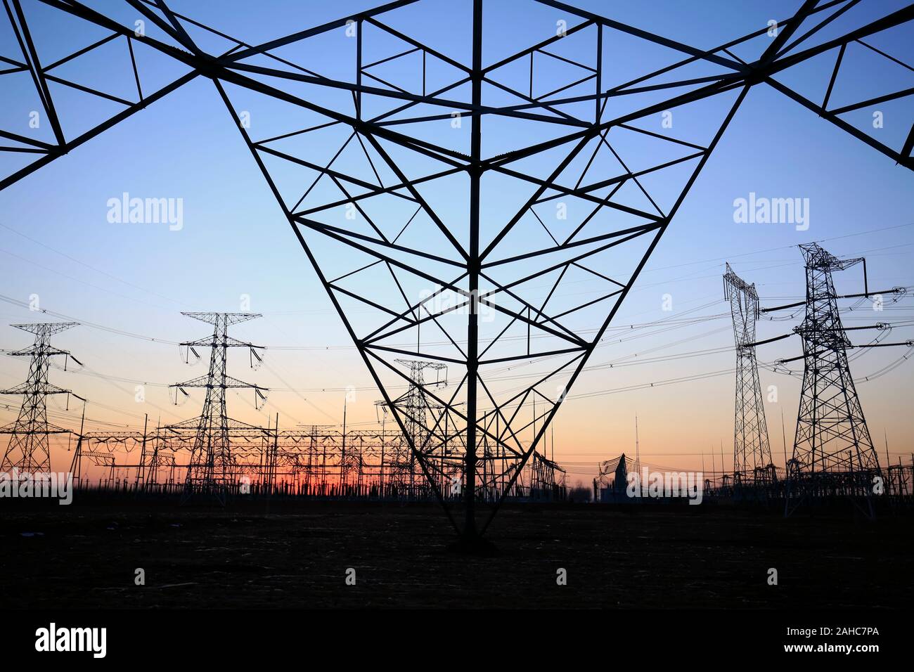 Electricity transmission pylon silhouette hi-res stock photography and ...