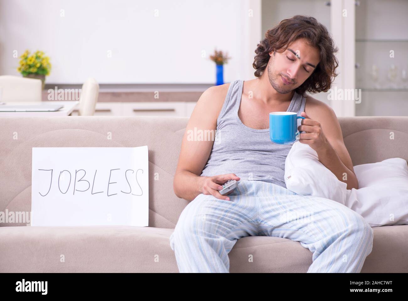 The unemployed man desperate at home Stock Photo - Alamy