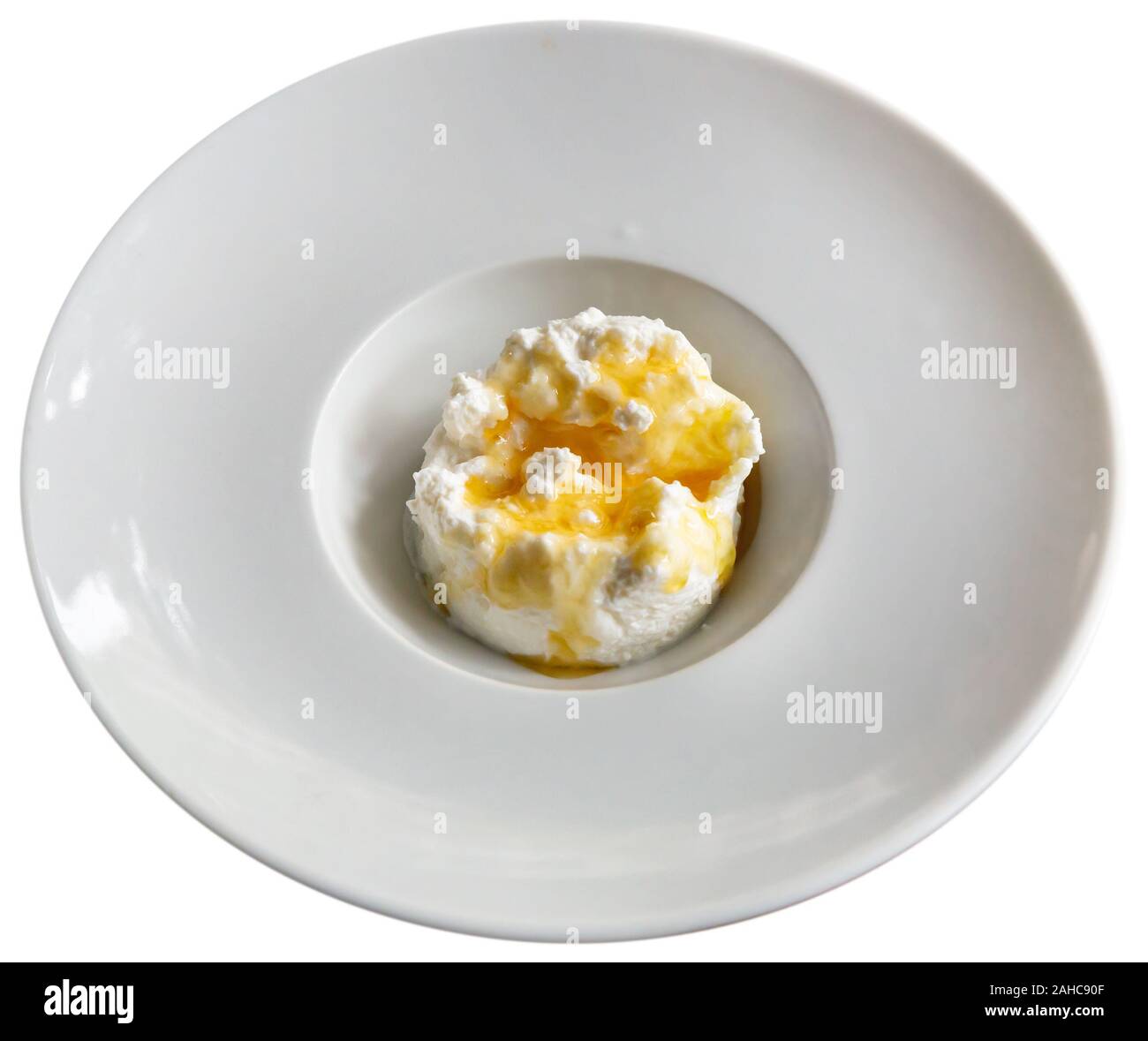 Mato with honey — traditional dessert of Catalonia. Isolated over white ...