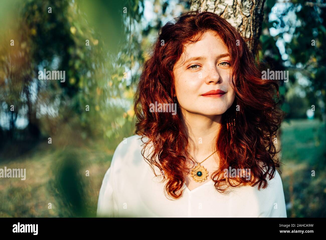 Girl curly hair and freckles hi-res stock photography and images - Alamy