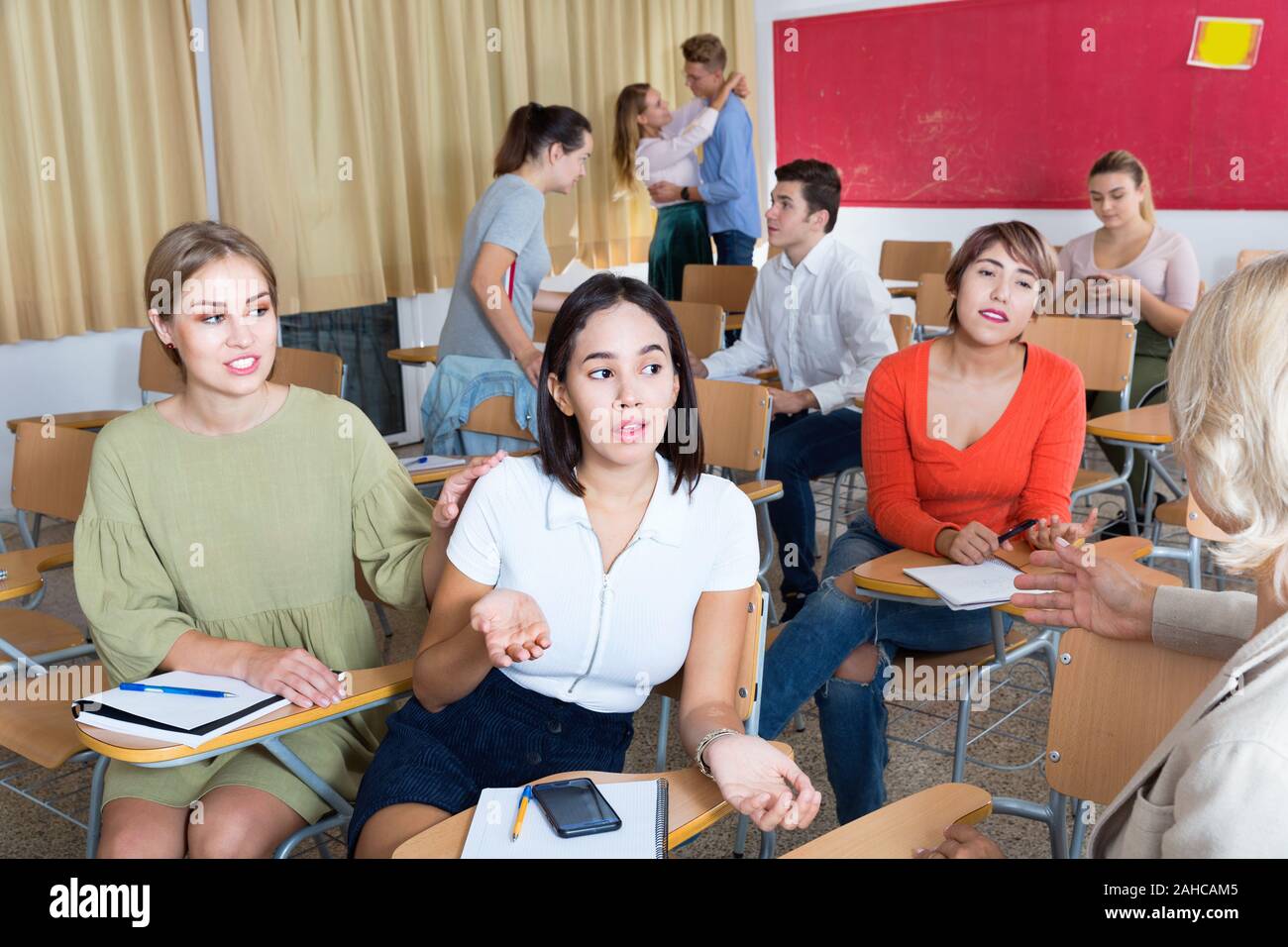 Group discussion between teacher hi-res stock photography and images ...