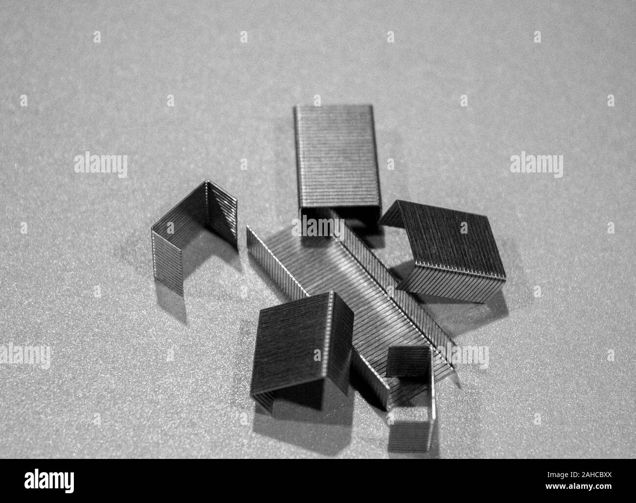Pile of staples Black and White Stock Photos & Images - Alamy