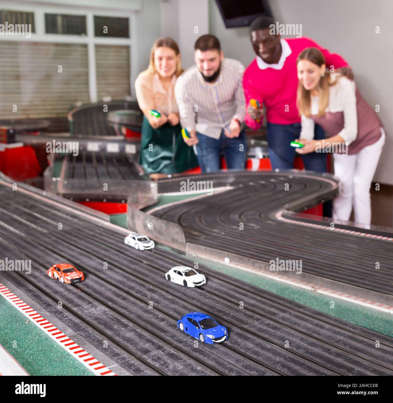 Happy friends couple racing hi-res stock photography and images - Alamy