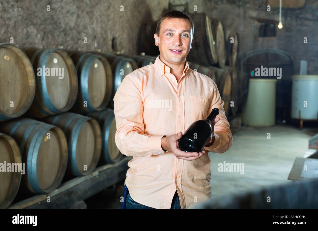 Cheerful owner winery standing hi-res stock photography and images - Alamy